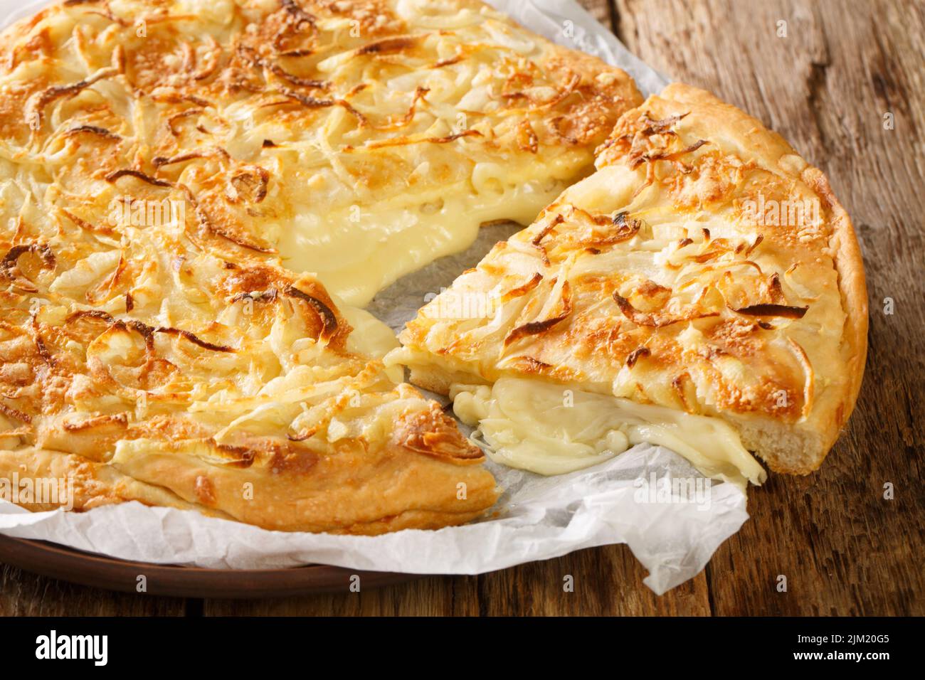 Fugazzeta Argentinian Stuffed Pizza is filled with a layer of ...
