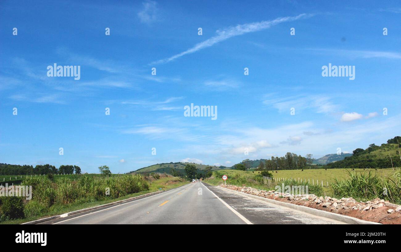 clean highway landscape in a beautiful blue sky Stock Photo - Alamy