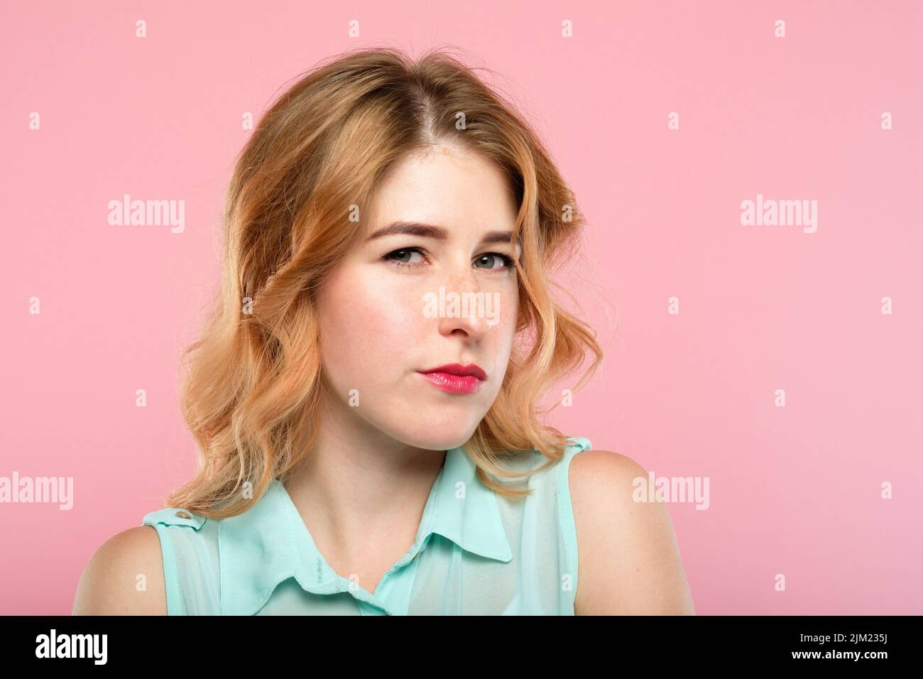 Dubious look hi-res stock photography and images - Alamy