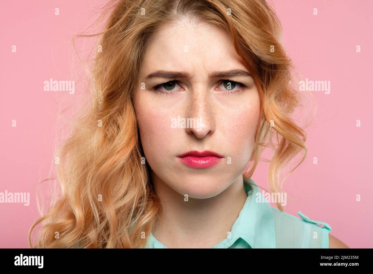 serious worried woman troubled look gathered brow Stock Photo - Alamy