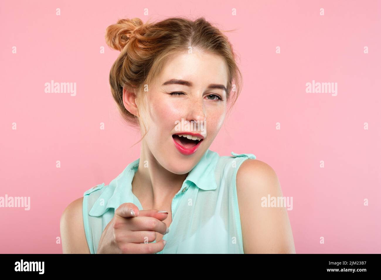 emotion expression smiling woman pleased winking Stock Photo - Alamy