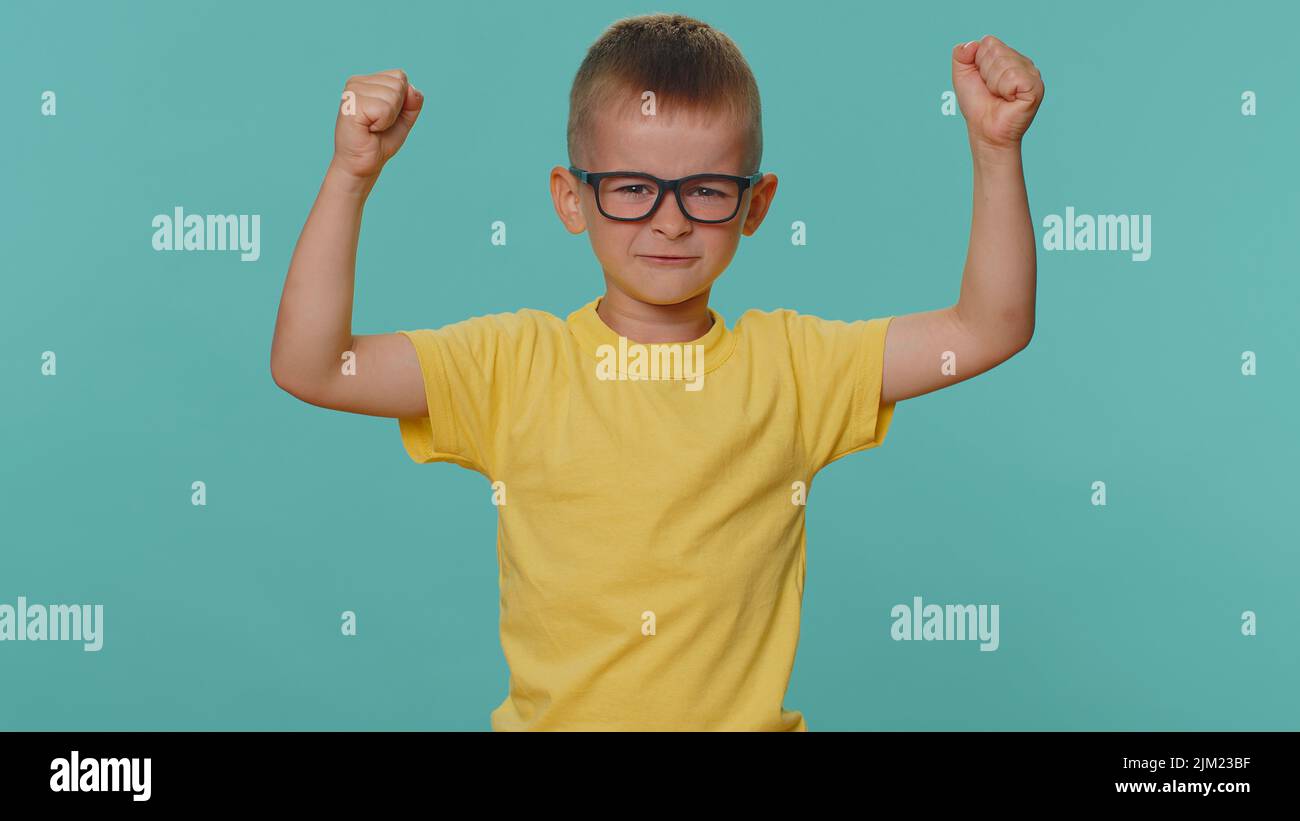 Boy showing biceps hi-res stock photography and images - Alamy
