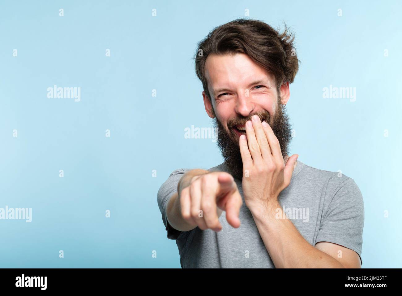 omg man mocking laughing point finger sneer abuse Stock Photo - Alamy