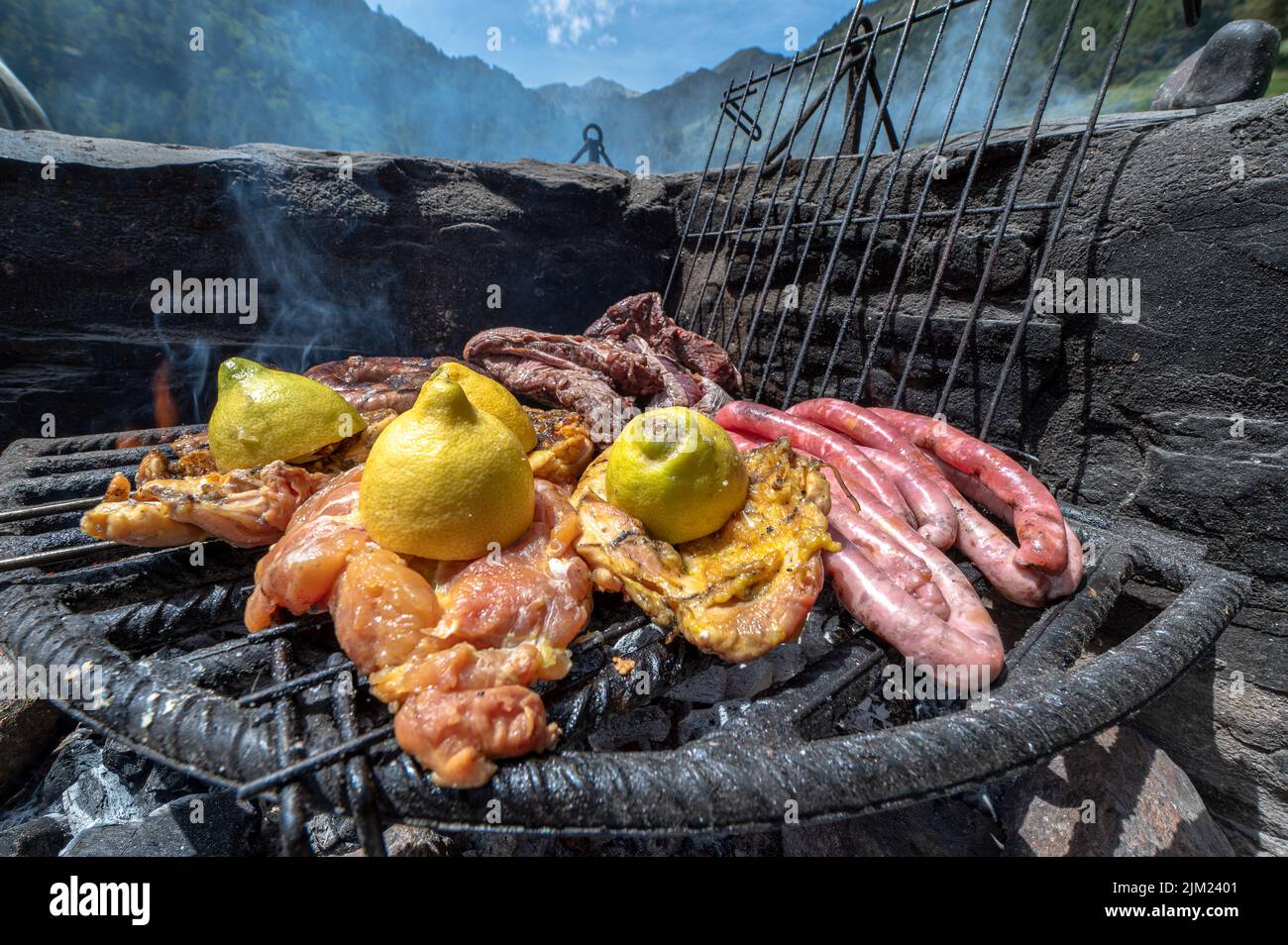 Typical Uruguayan and Argentine Asado Cooked on fire. Entrana and Vacio ...