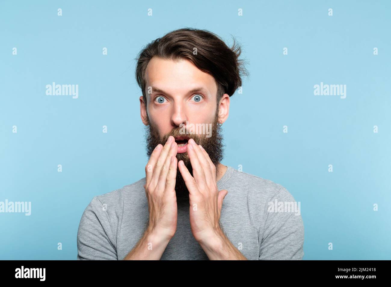 omg shocked astounded man open mouth emotion Stock Photo - Alamy
