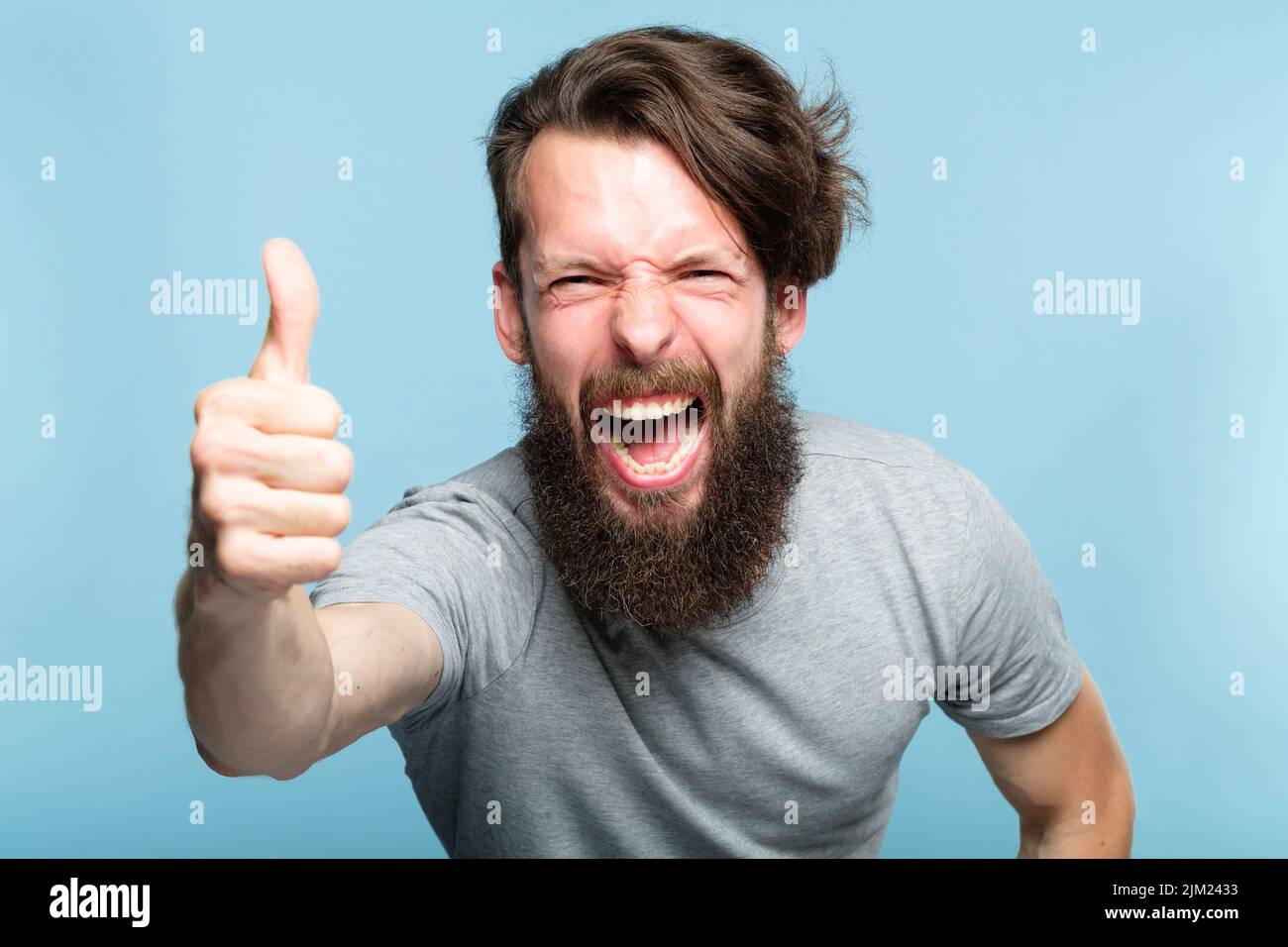 thumb up like enthusiastic overexcited man gesture Stock Photo - Alamy