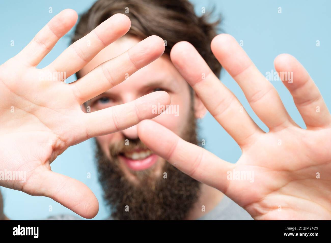 man shutting out private life hands forward block Stock Photo - Alamy