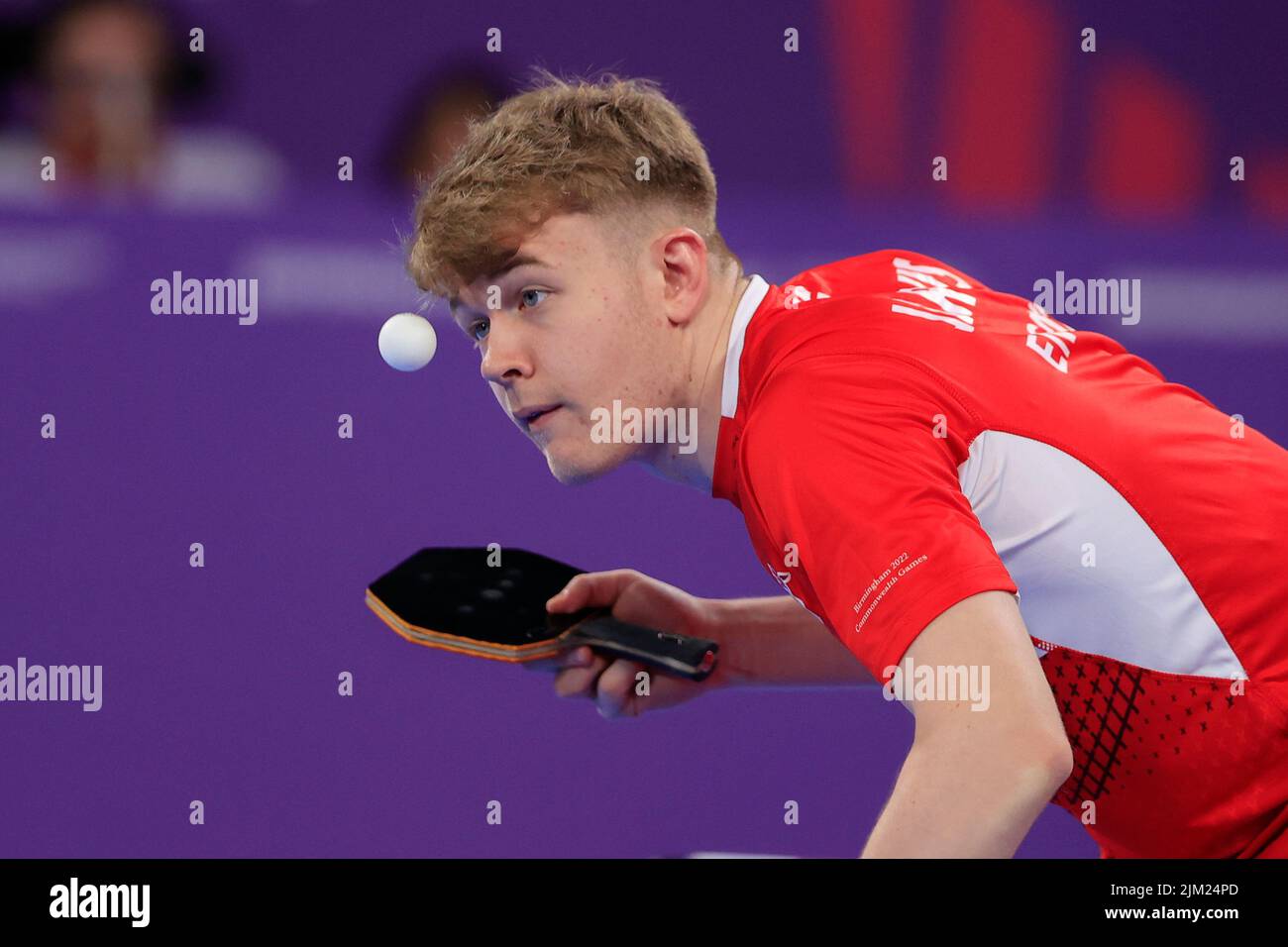 Tom Jarvis of England serves the ball in the game against Geoffrey Loi ...