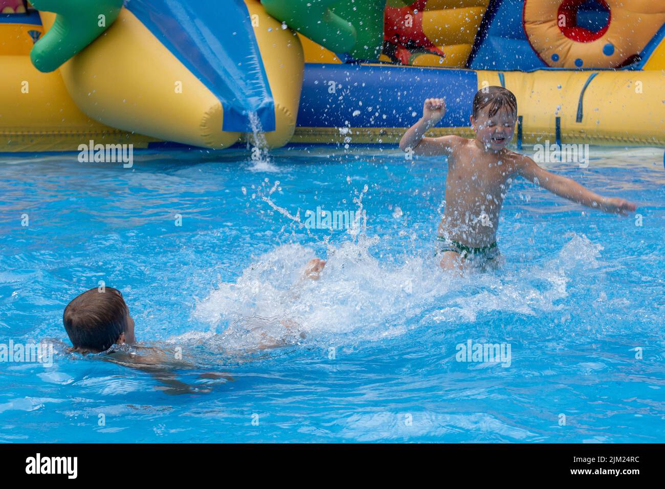 Children group splashing kids splash hi-res stock photography and ...