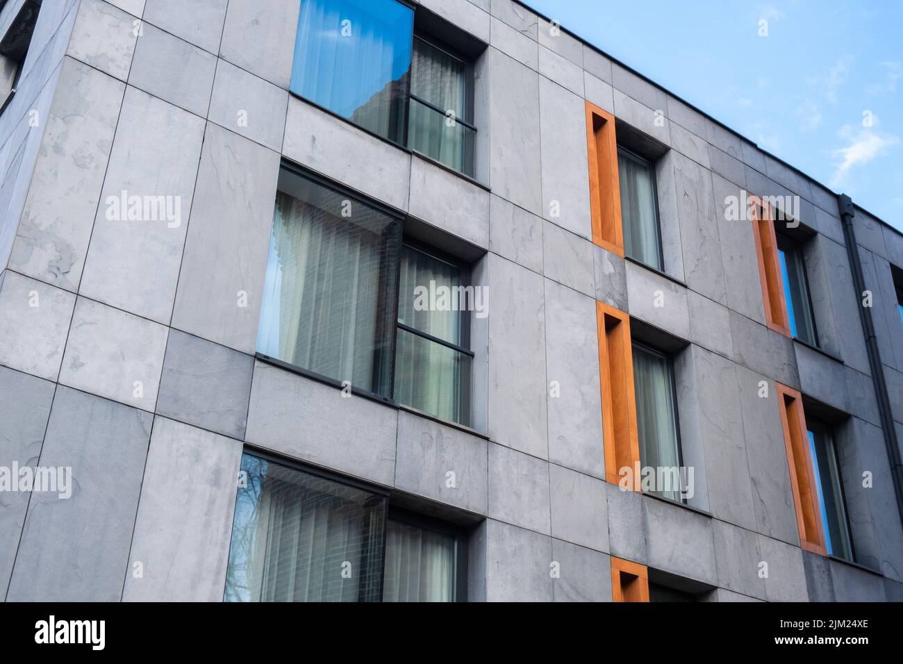 Exterior of modern architecture. Black windows, the facade of a modern ...