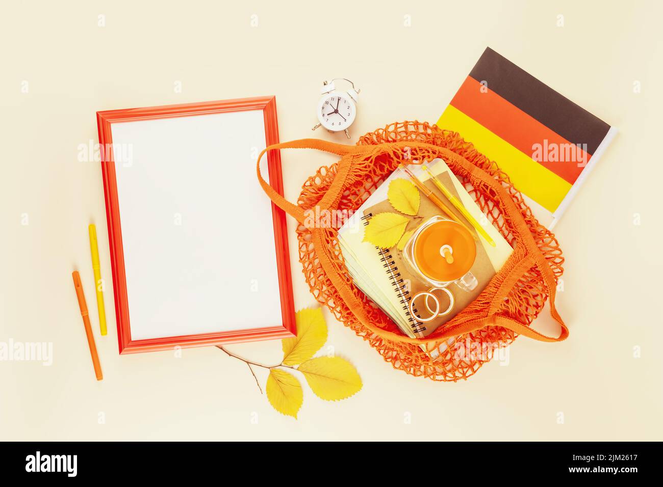 Back to school in Germany. School supplies in a bright yellow textile ...