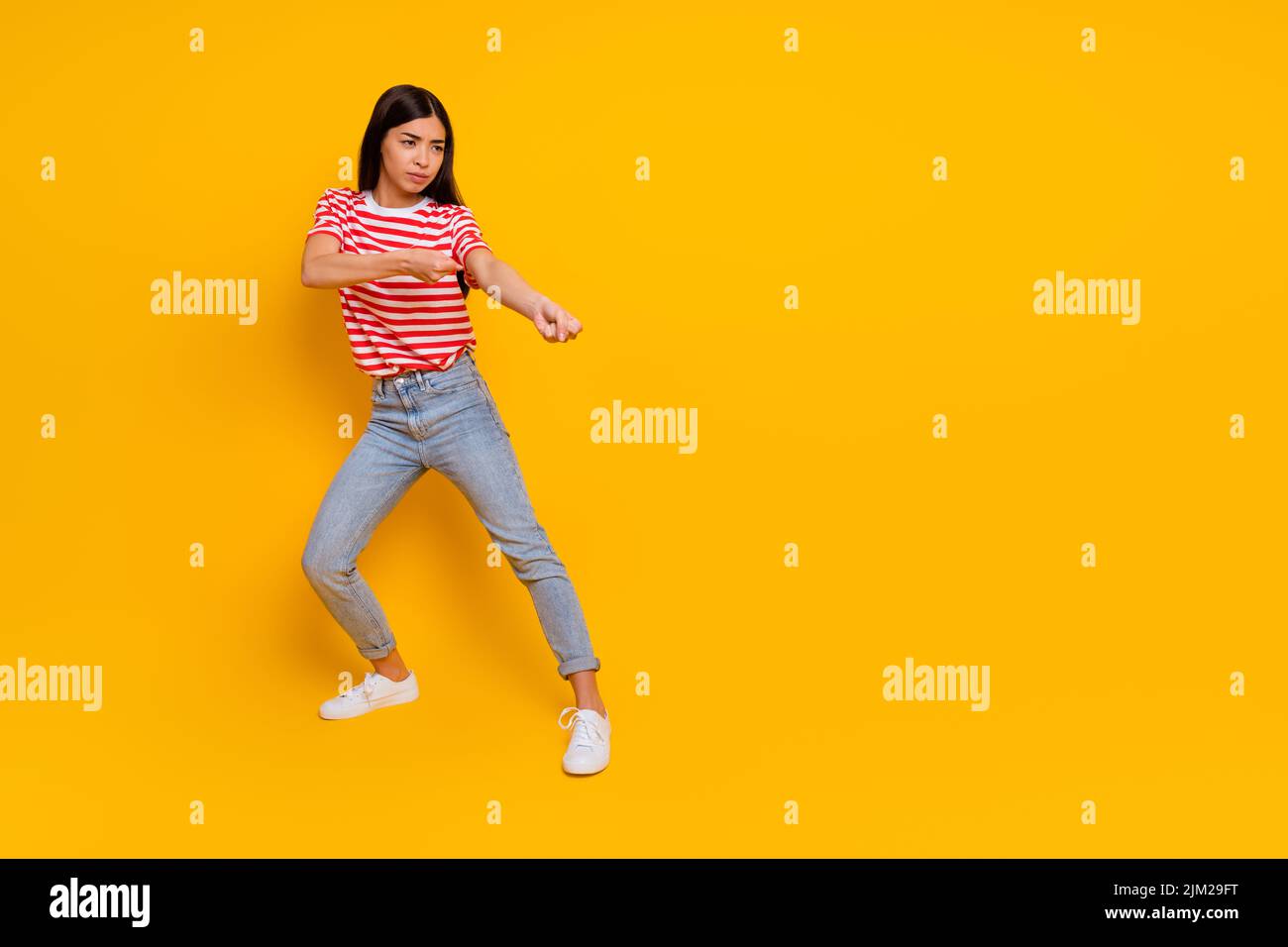 Full body portrait of focused concentrated person hands pull empty ...