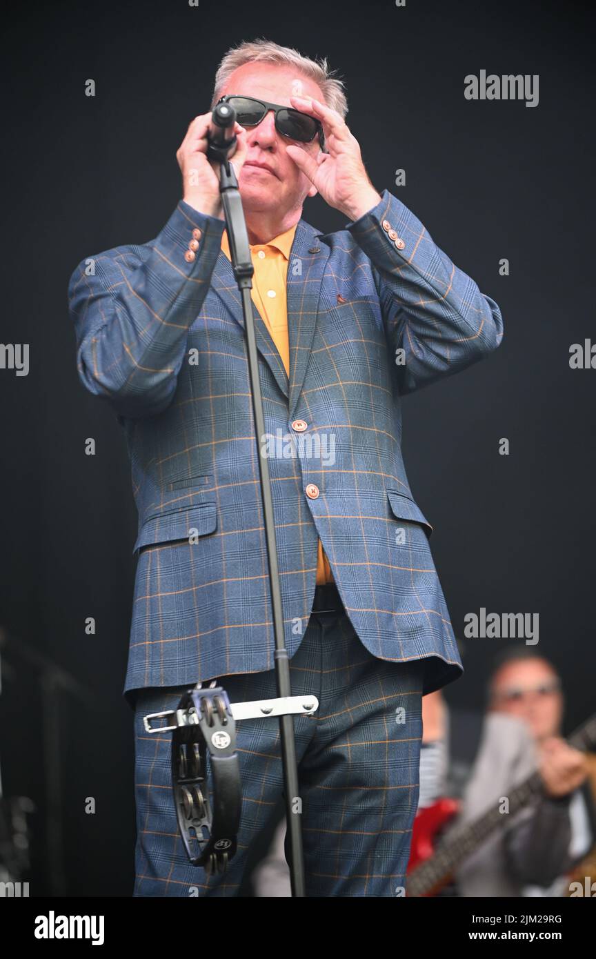 Lead Singer, Graham McPherson, known by his stage name Suggs, performs ...