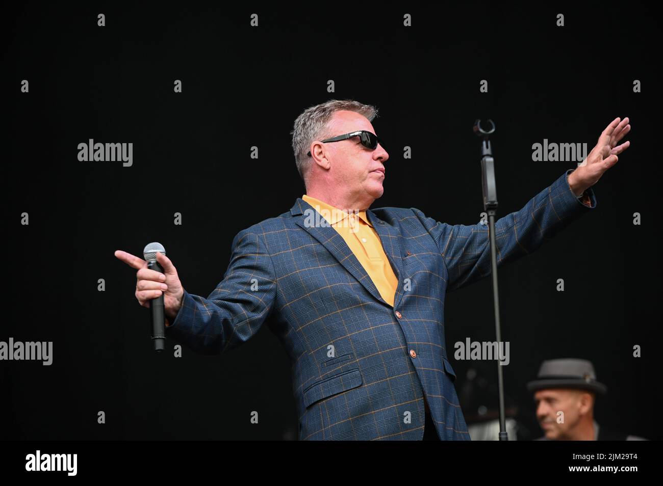 Lead Singer, Graham McPherson, known by his stage name Suggs, performs ...