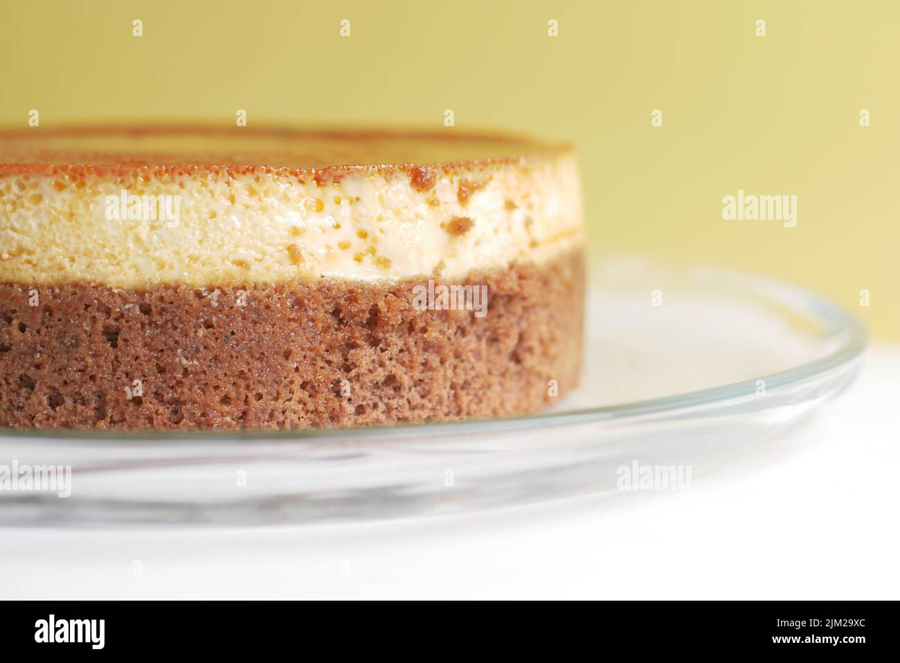 Caramel custard pudding on a plate on table Stock Photo - Alamy