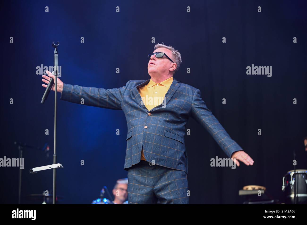 Lead Singer, Graham McPherson, known by his stage name Suggs, performs ...