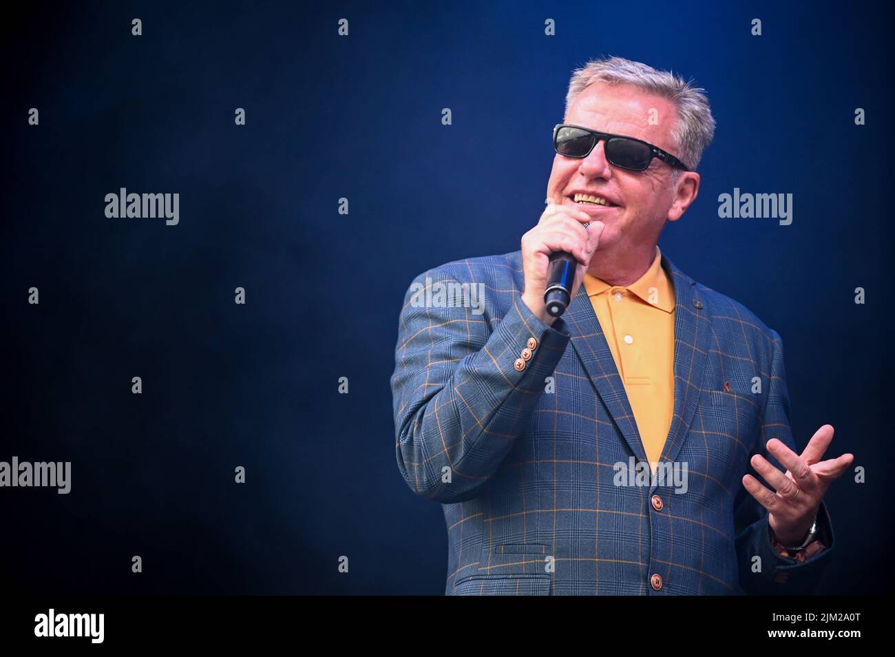 Lead Singer, Graham McPherson, known by his stage name Suggs, performs ...
