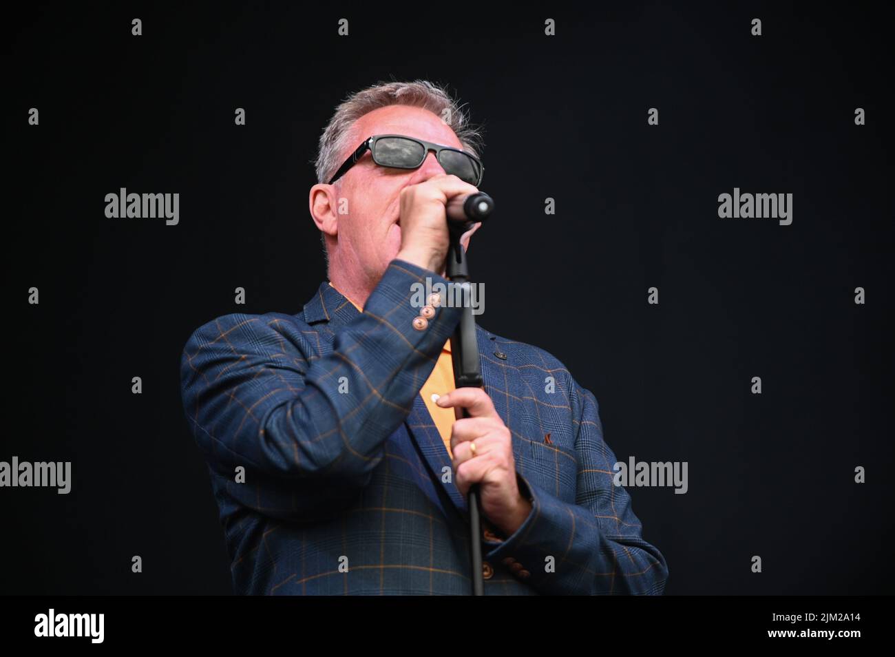 Lead Singer, Graham McPherson, known by his stage name Suggs, performs ...