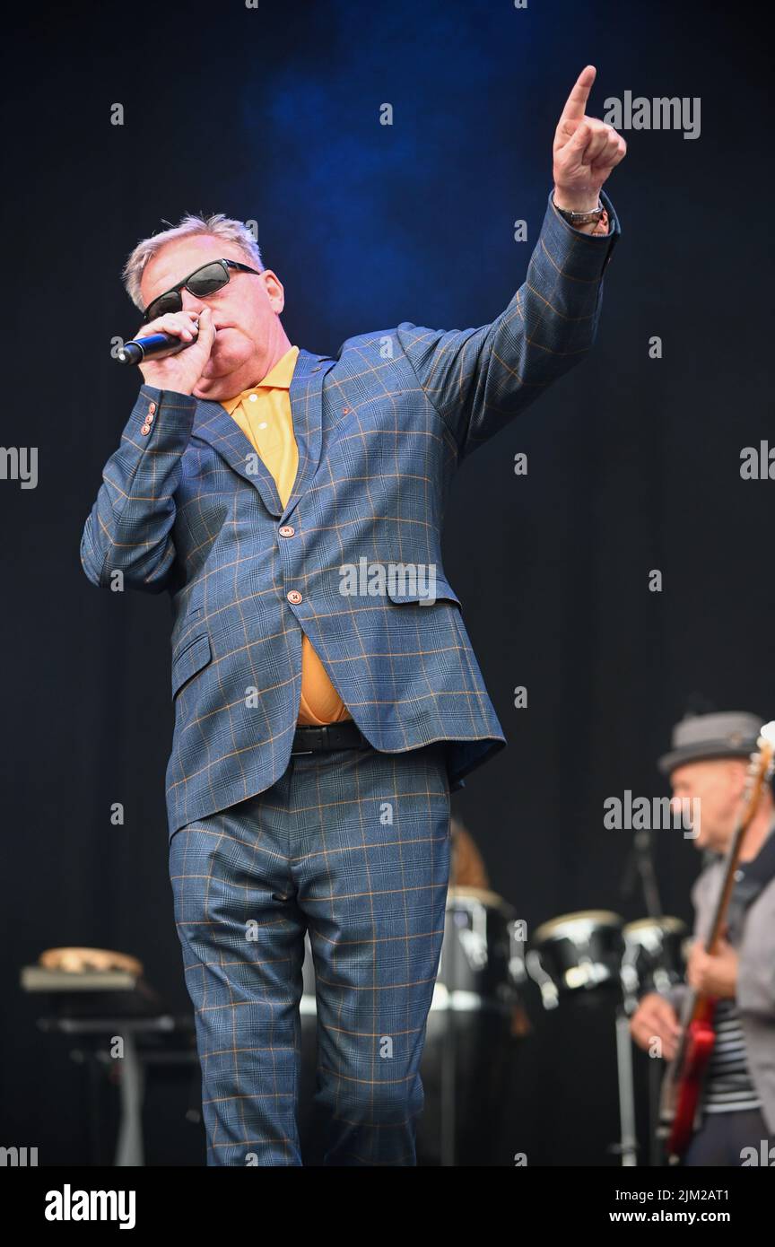 Lead Singer, Graham McPherson, known by his stage name Suggs, performs ...