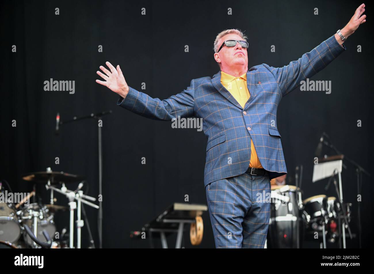 Lead Singer, Graham McPherson, known by his stage name Suggs, performs ...