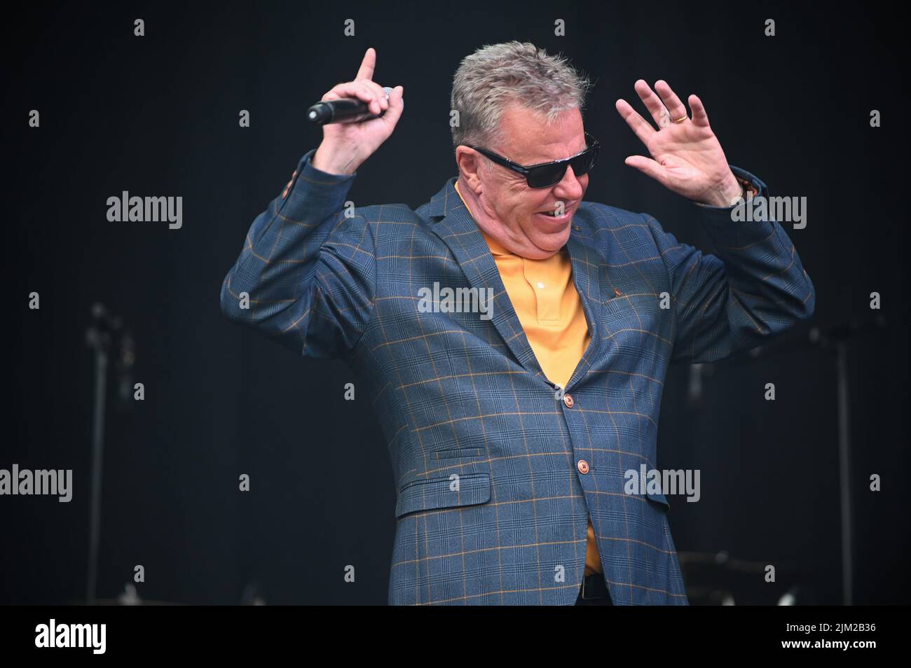 Lead Singer, Graham McPherson, known by his stage name Suggs, performs ...