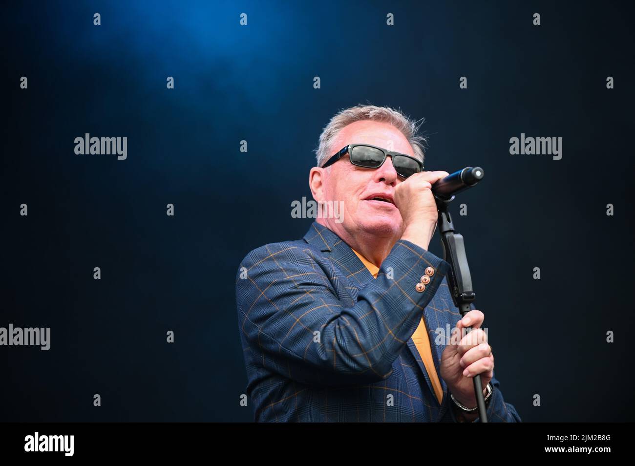 Lead Singer, Graham McPherson, known by his stage name Suggs, performs ...