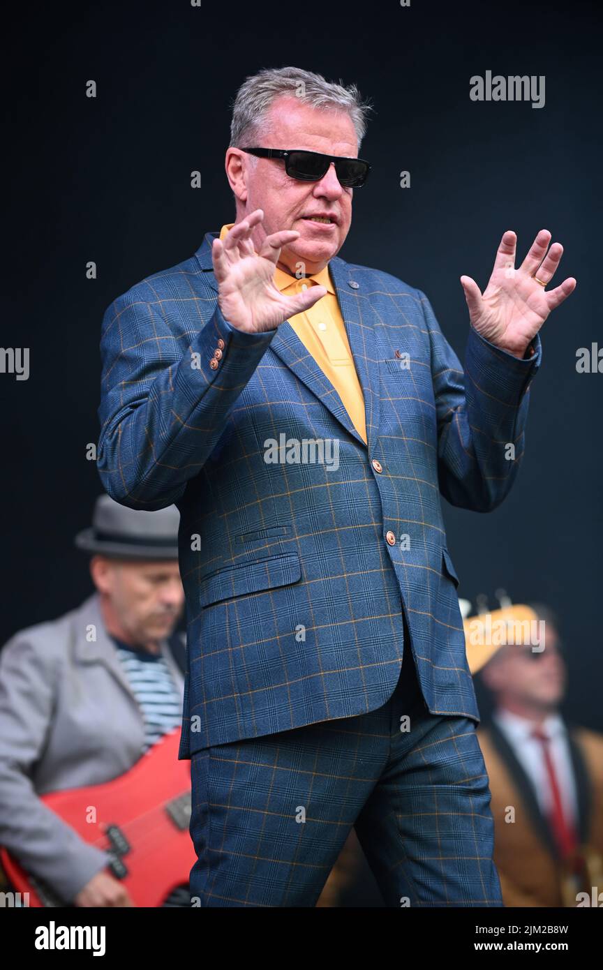 Lead Singer, Graham McPherson, known by his stage name Suggs, performs ...