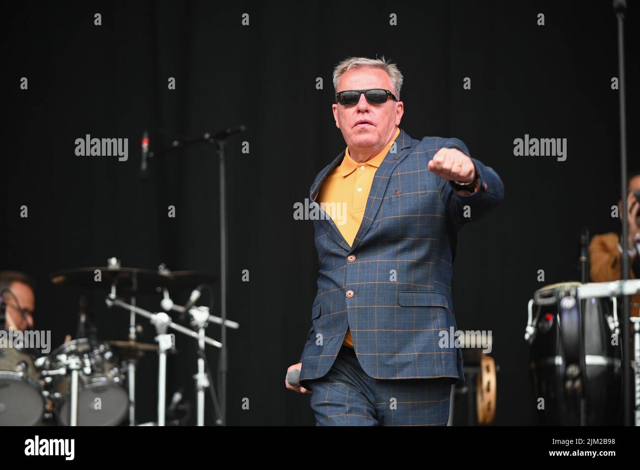 Lead Singer, Graham McPherson, known by his stage name Suggs, performs ...