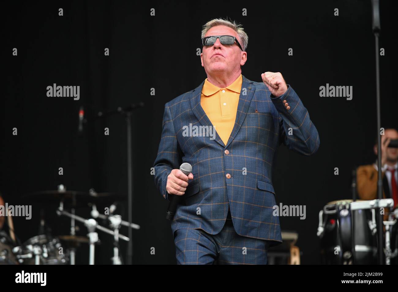 Lead Singer, Graham McPherson, known by his stage name Suggs, performs ...