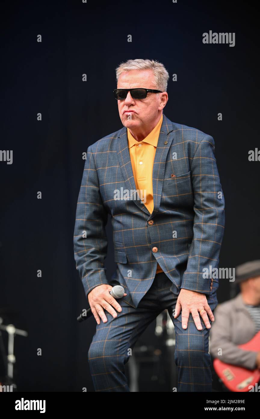 Lead Singer, Graham McPherson, known by his stage name Suggs, performs ...