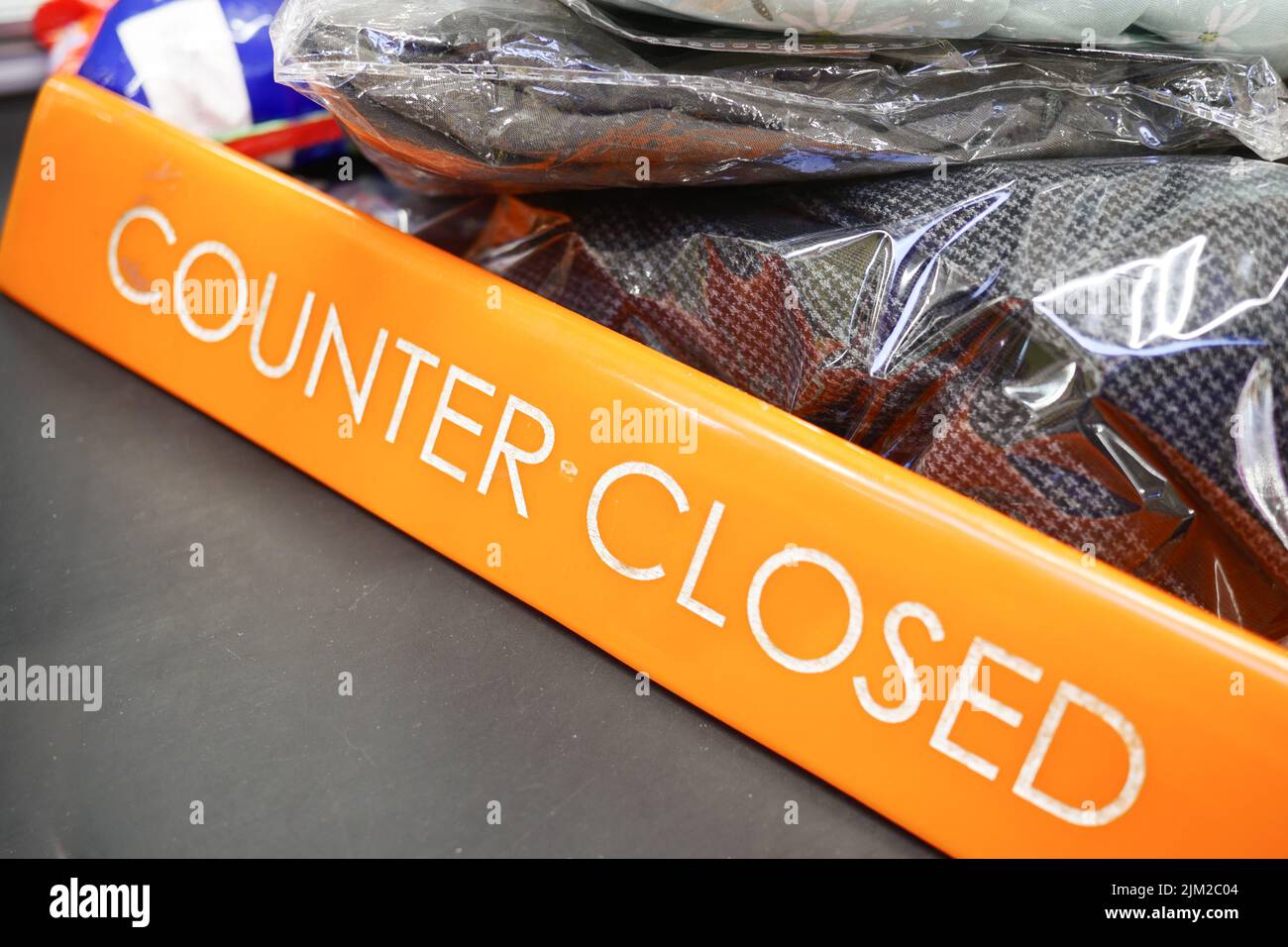 the counter closed sign on super shop checkout counter Stock Photo - Alamy