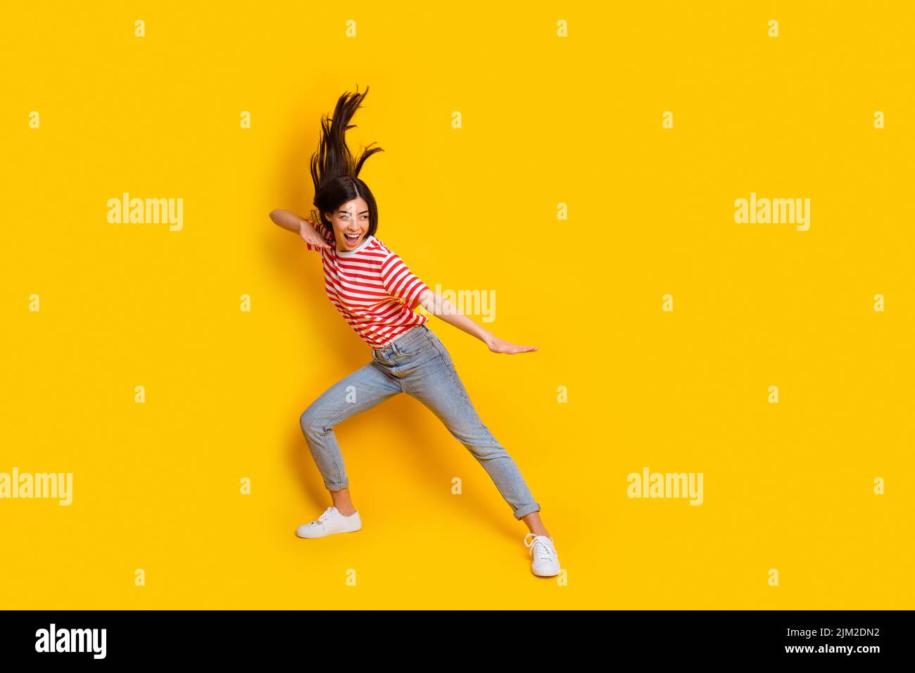 Full body profile portrait of energetic active person fight empty space ...