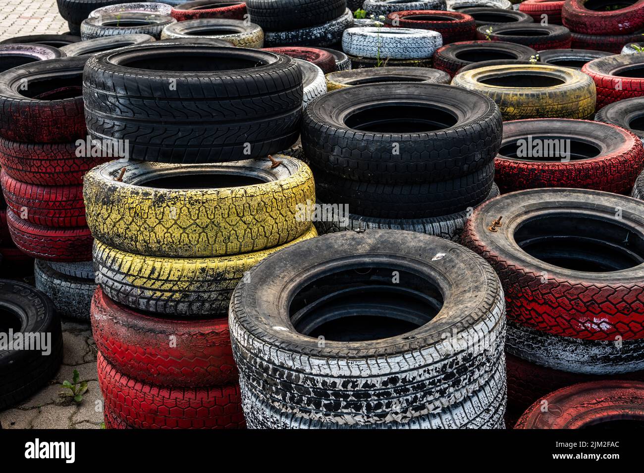 Pile Of Old Used Car And Bike Tyres Representing Hazardous Waste And ...