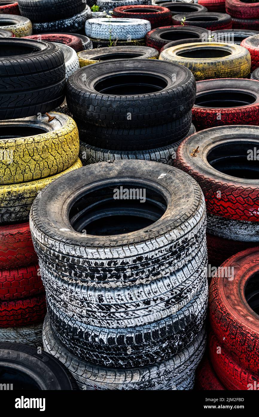 Pile Of Old Used Car And Bike Tyres Representing Hazardous Waste And ...