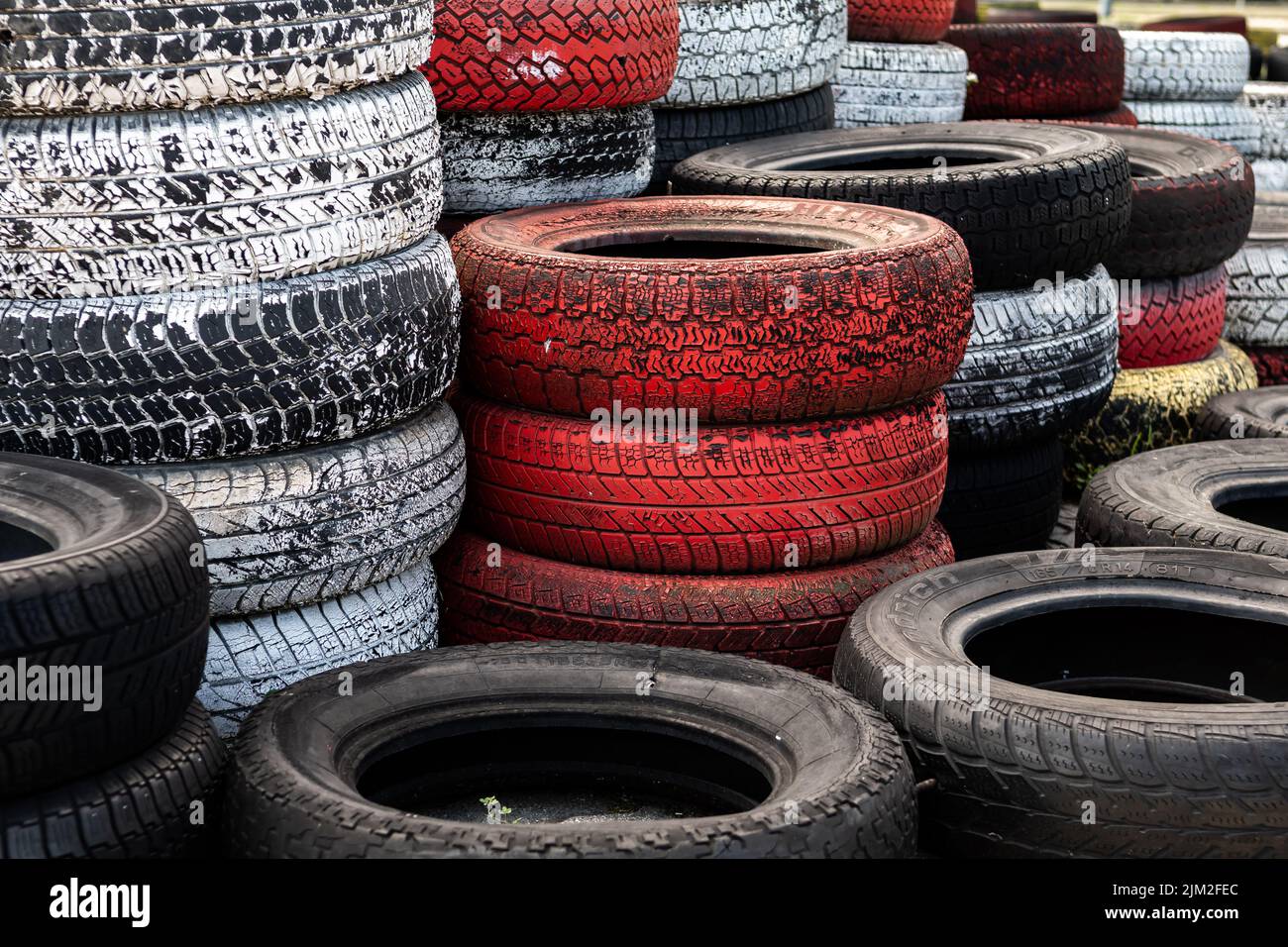 Pile Of Old Used Car And Bike Tyres Representing Hazardous Waste And ...