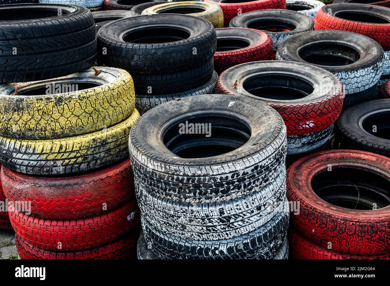 Pile Of Old Used Car And Bike Tyres Representing Hazardous Waste And ...