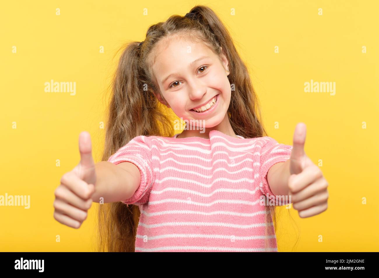 smiling child show thumbs up success approval Stock Photo - Alamy smiling child show thumbs up success approval Stock Photo - Alamy