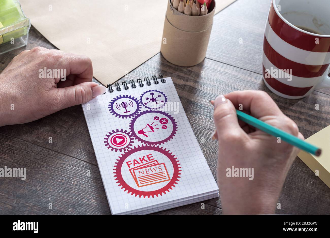 Fake news concept drawn on a notepad Stock Photo - Alamy
