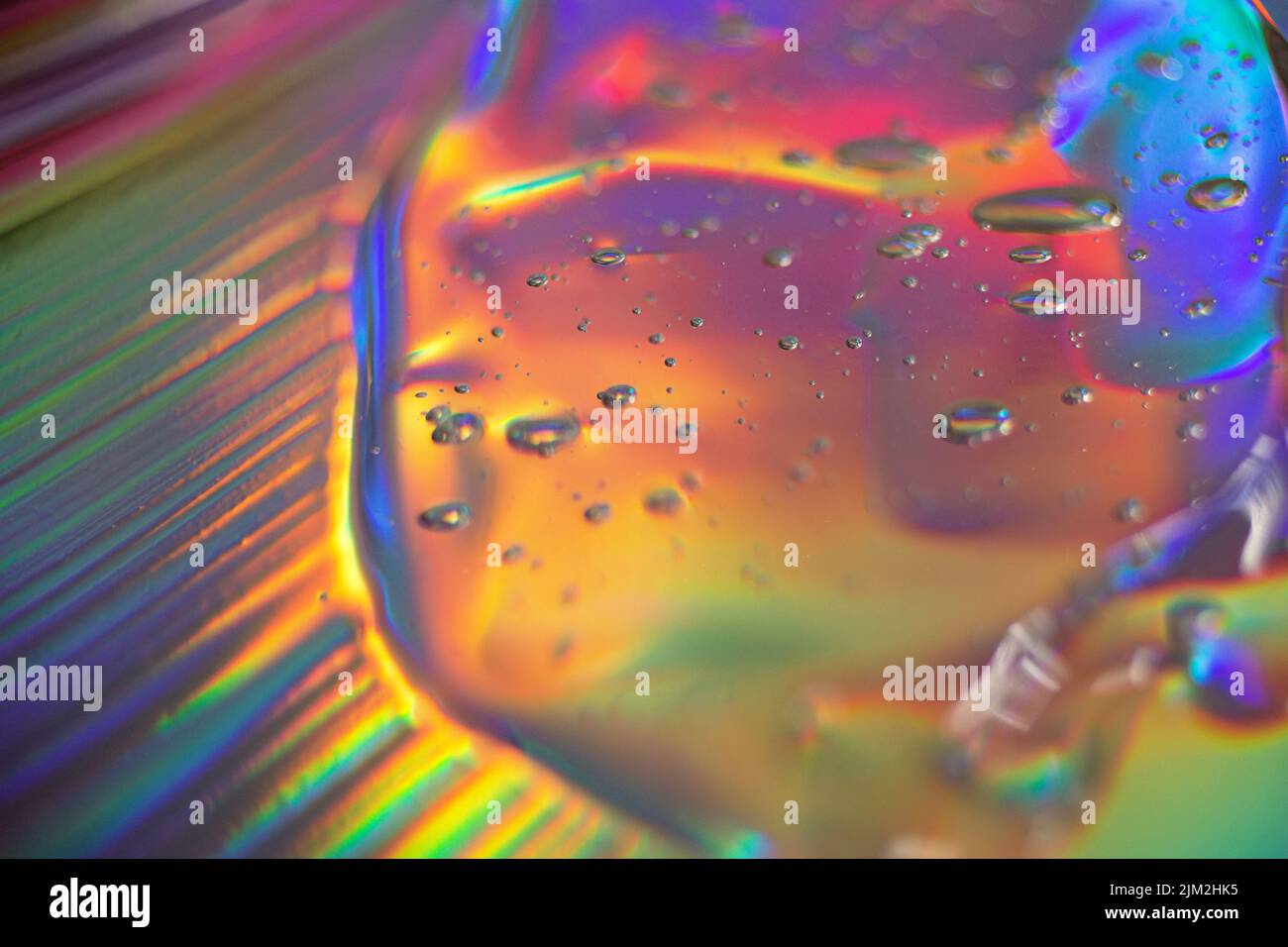 Abstract cosmetics gel on holographic background.Good as cosmetic ...