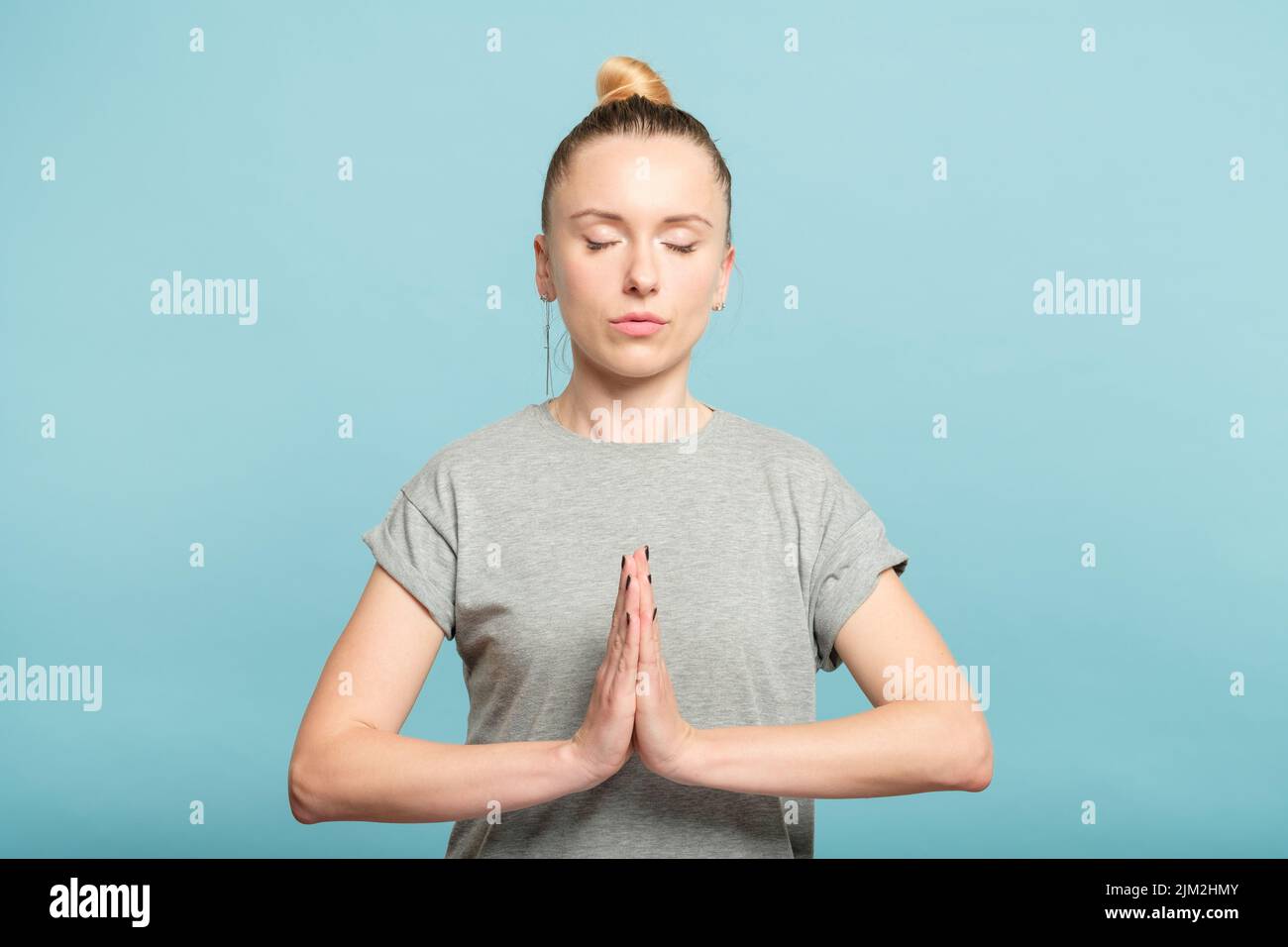 namaste woman gesture yoga practice meditation Stock Photo - Alamy