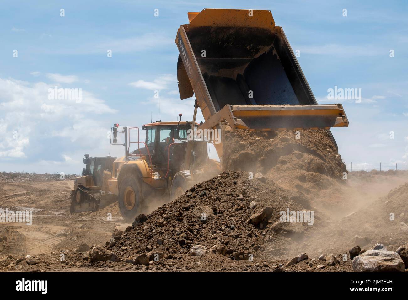 Construction crews are building a new stretch of highway in this part ...