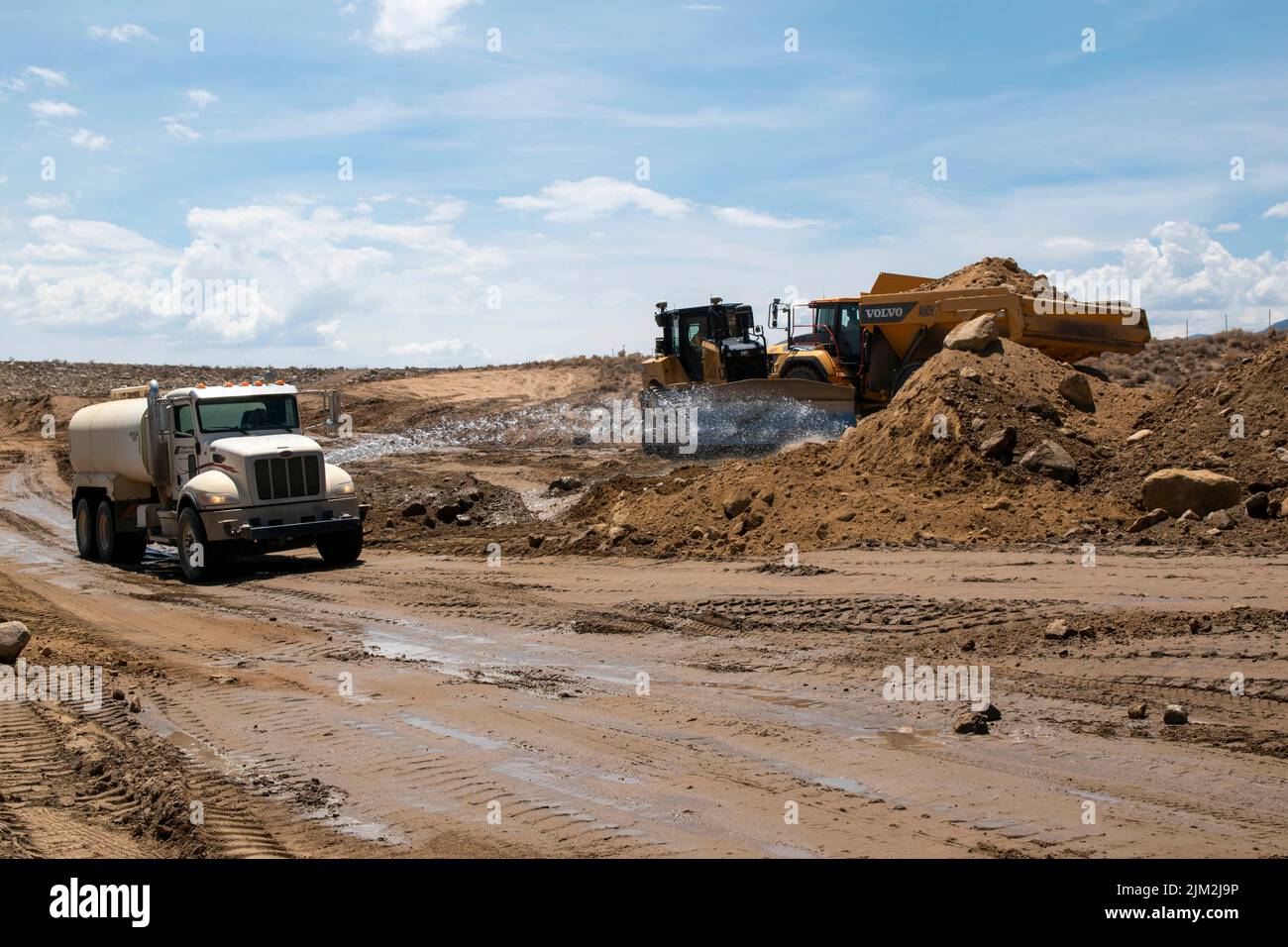 Construction crews are building a new stretch of highway in this part ...