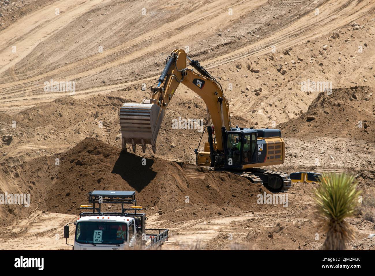 Construction crews are building a new stretch of highway in this part ...