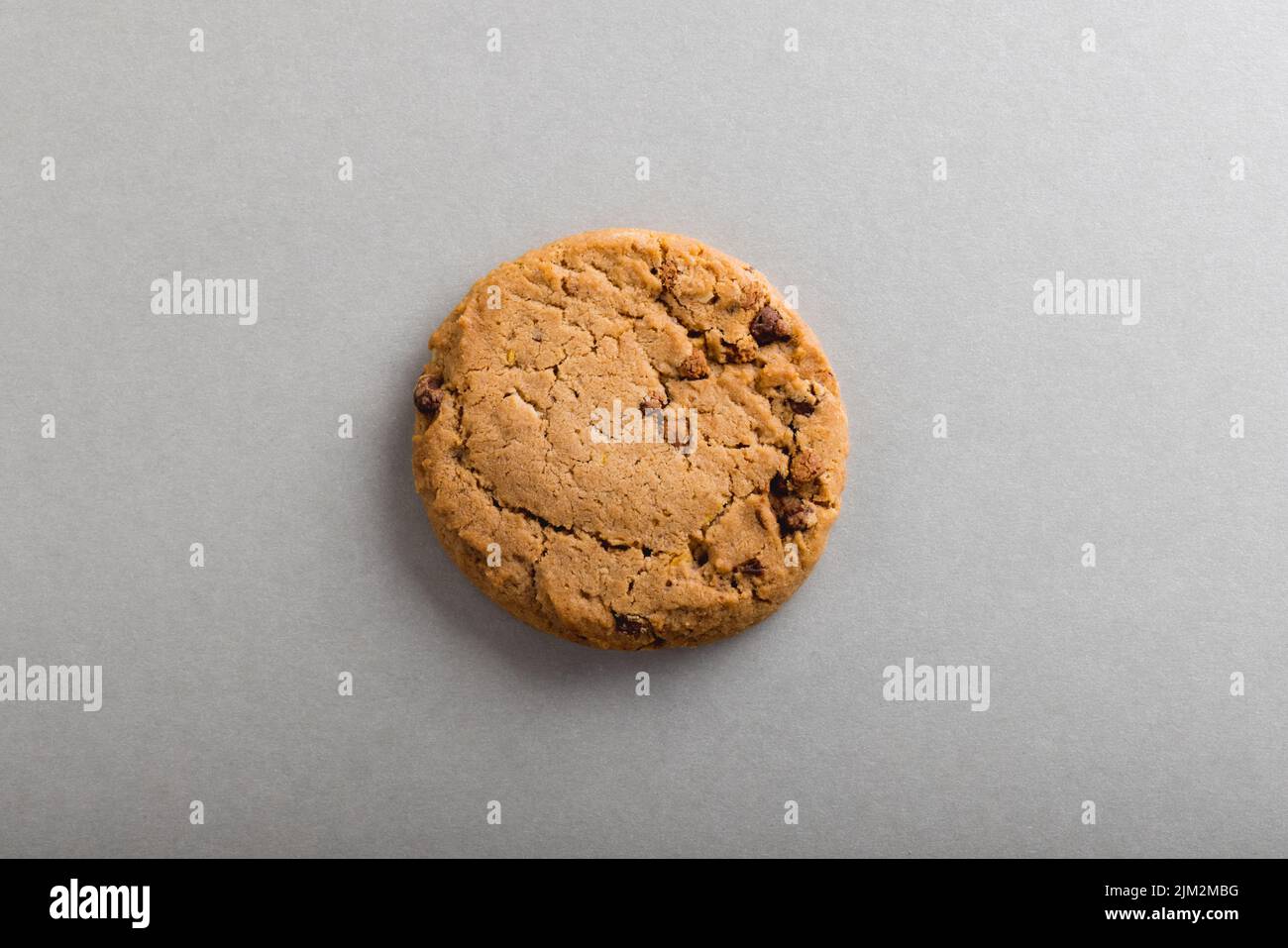 Overhead view of cookie on gray background with copy space Stock Photo ...
