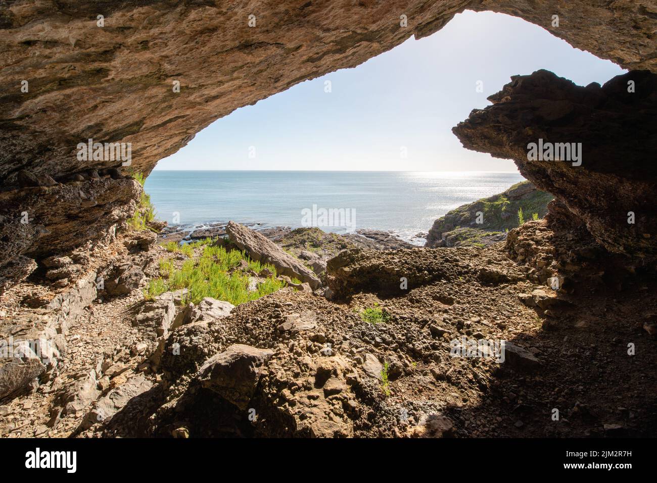 View looking out of Bacon Hole bone cave, Gower, Wales, UK Stock Photo ...