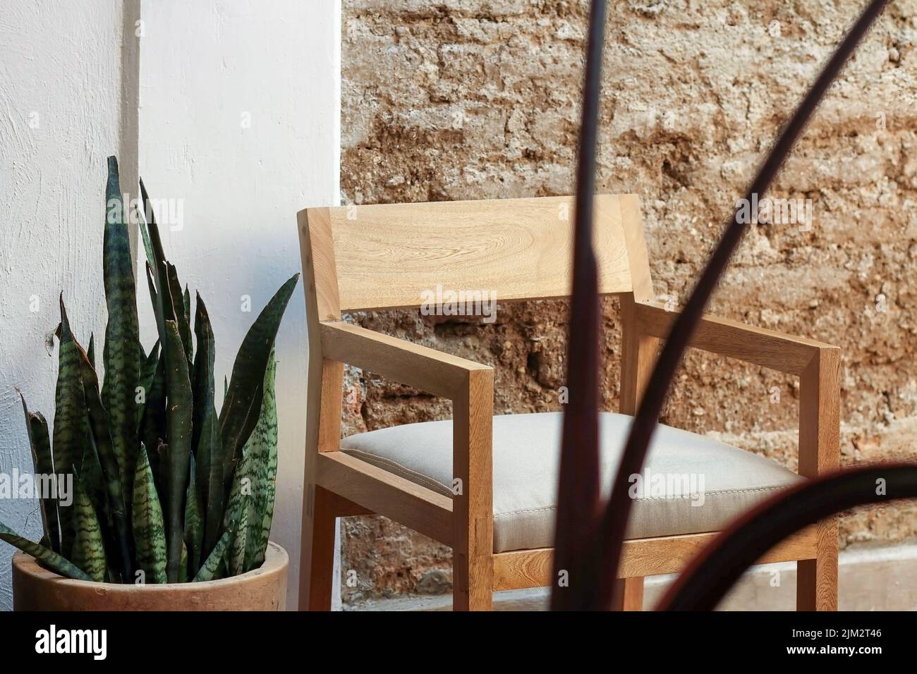 A chair modern wood frame with wooden, sunlight coming through the ...