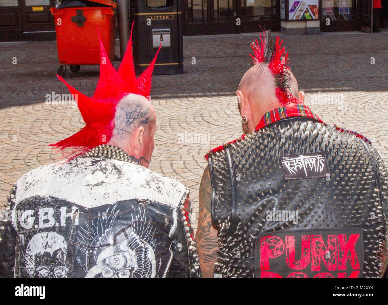 Punk Rocker wearing heavy metal leather spiked jacket in Blackpool ...