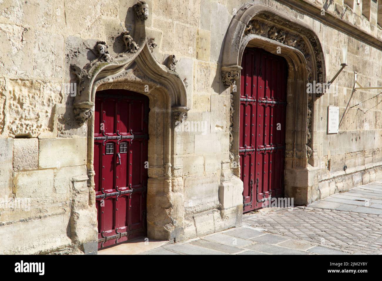 Old Entrance doors of the "Musée de Cluny" with the carved stone arches ...