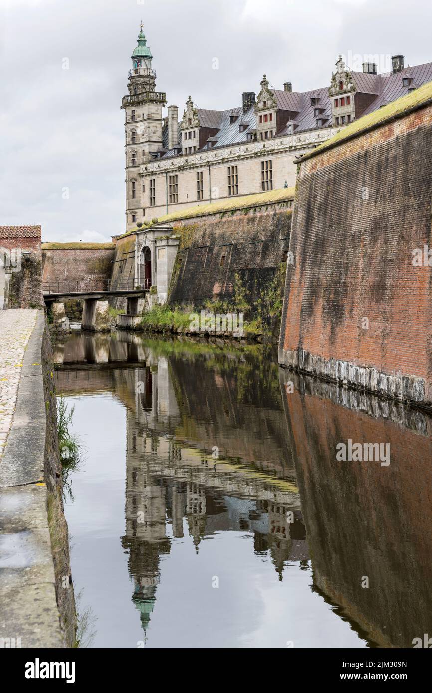 castle and ramparts reflecting in moat water at Kronborg castle, shot ...