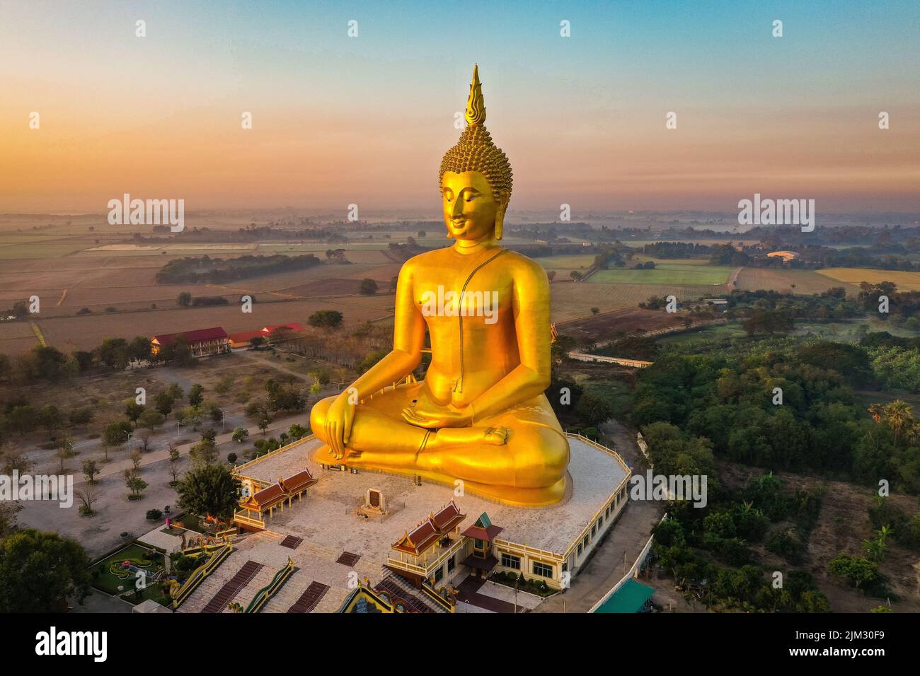 Big Buddha during sunset at Wat Muang in Ang Thong, Thailand Stock ...